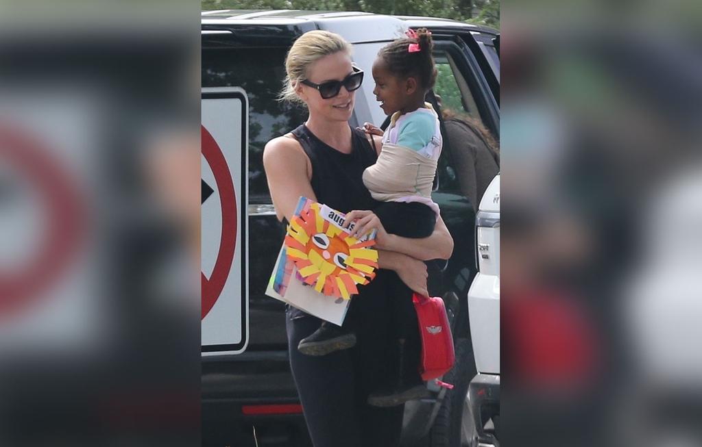 PICS Charlize Theron And Her Daughter August Show Precious PDA