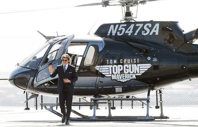 Tom Cruise Touches Down At 'Top Gun' Premiere In Helicopter