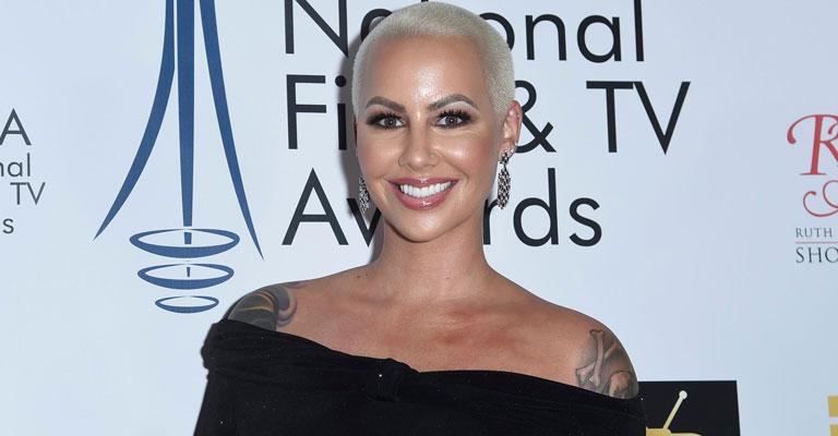 The Meaning Behind Amber Rose's Massive Forehead Tattoo Revealed