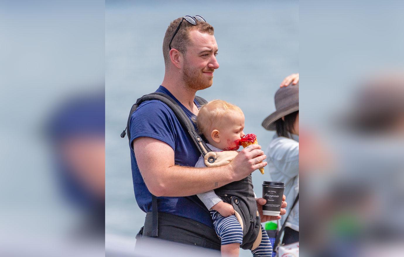 Sam Smith Babysits His Friend’s Baby & Spills Ice Cream All Over His Face