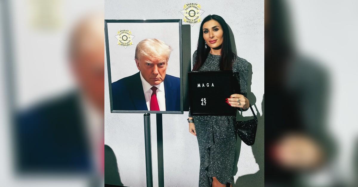 Trump Fans Pose Beside President's Mugshot & McDonald's Photos