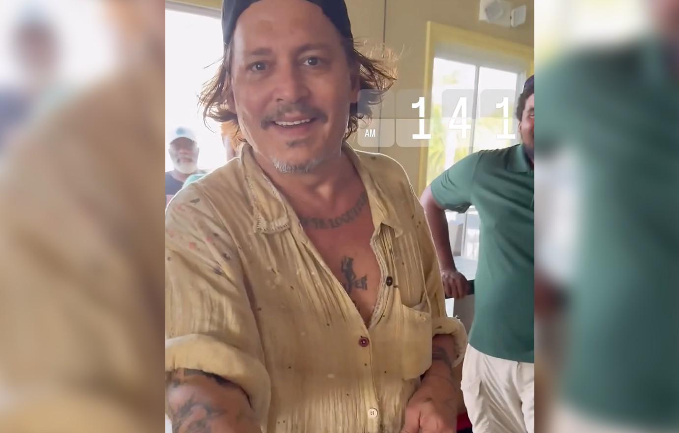 Johnny Depp Shows Off New Teeth In New Video
