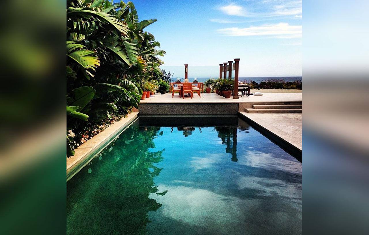 Inside Pierce Brosnan's Beachfront Mansion In Malibu: See Photos