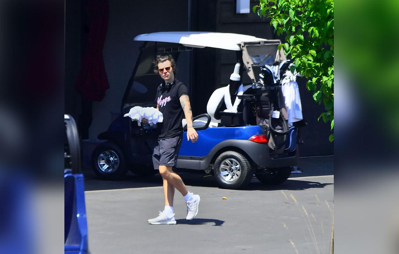 See Harry Styles Show Off His Biceps At A Golf Retreat