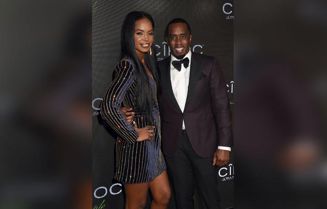 Diddy Makes Out With New Chick — See The Pics