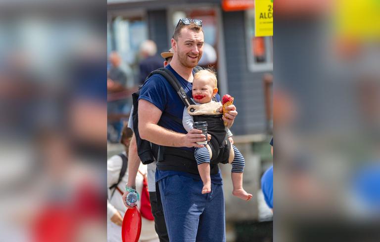 Sam Smith Babysits His Friend’s Baby & Spills Ice Cream All Over His Face