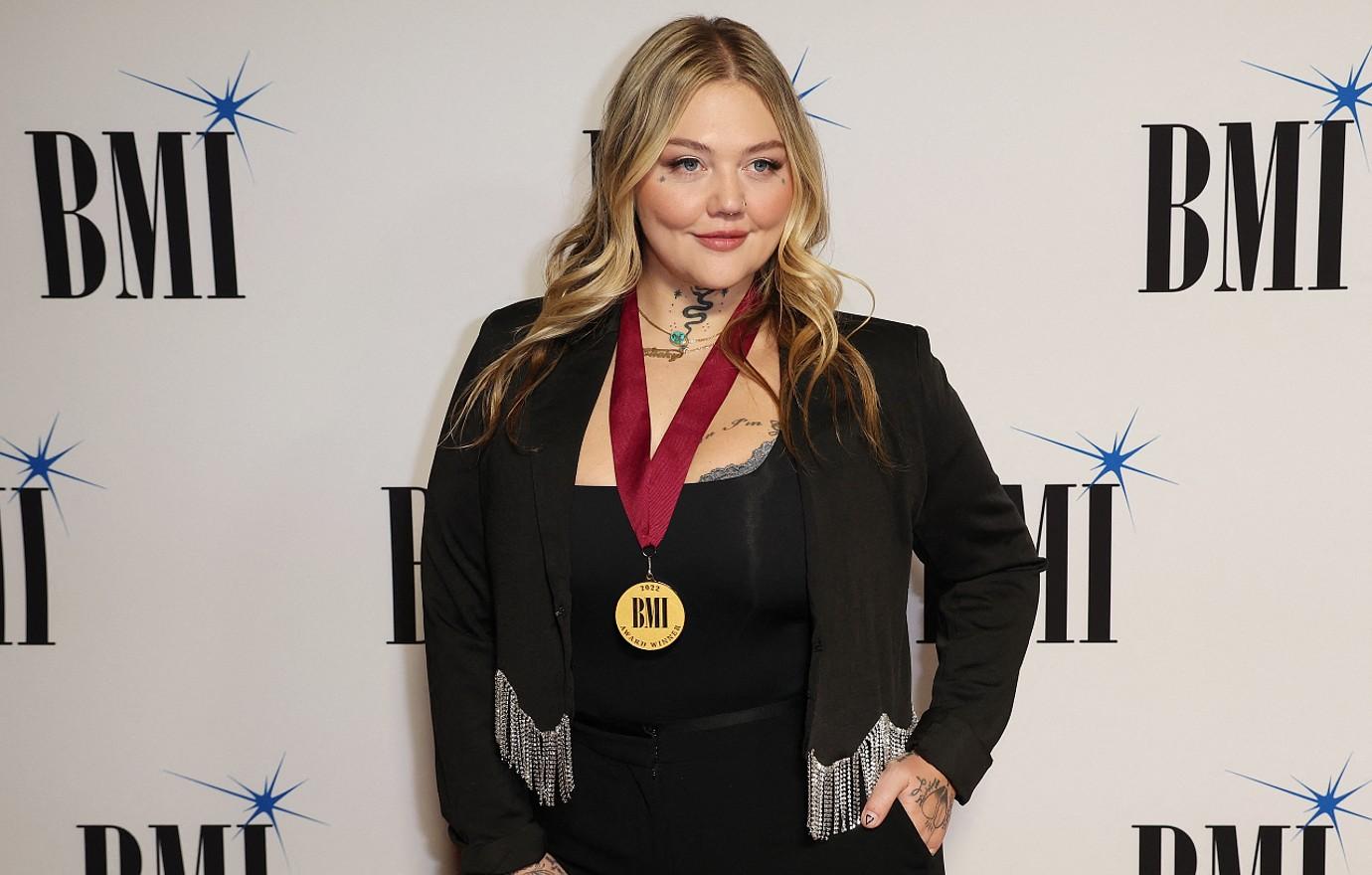 Elle King Gets Tattoo On Rear-End In Honor Of The Men Raising Her Son