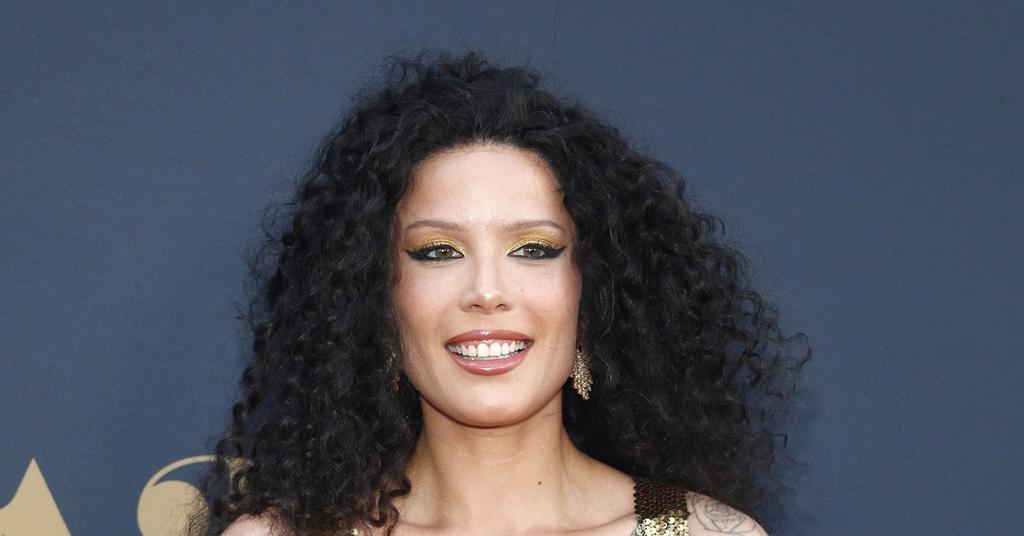 Halsey Stuns In Daring Gold Gown At 'MaXXXine' Premiere: Photos