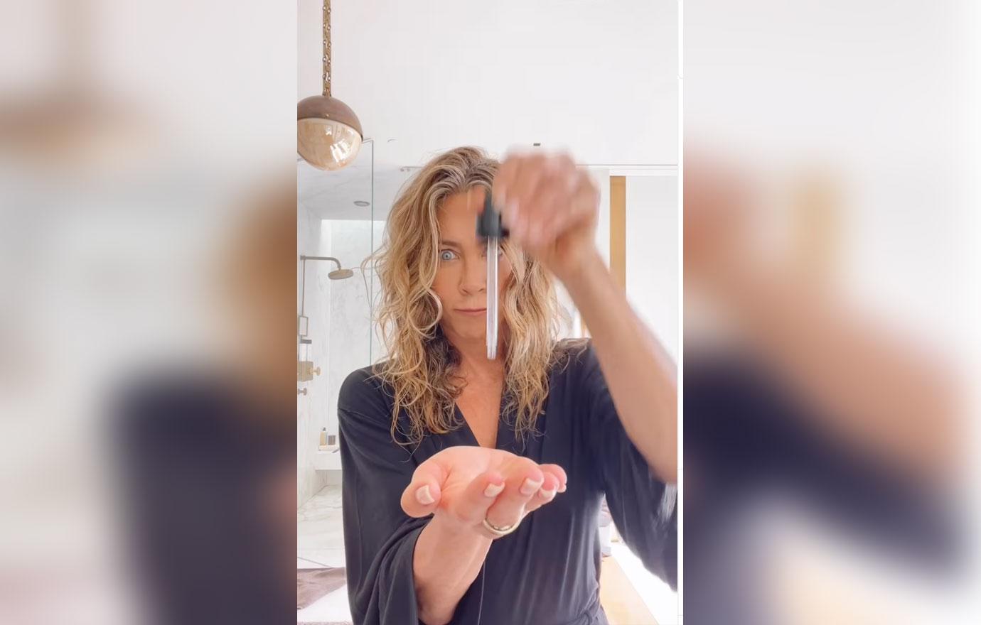 Jennifer Aniston Shows Off Natural Curly Locks In Bathroom Video
