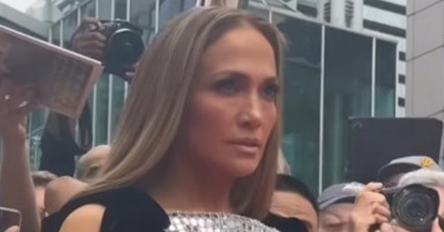 Jennifer Lopez Stuns In Shimmering Silver Gown At TIFF