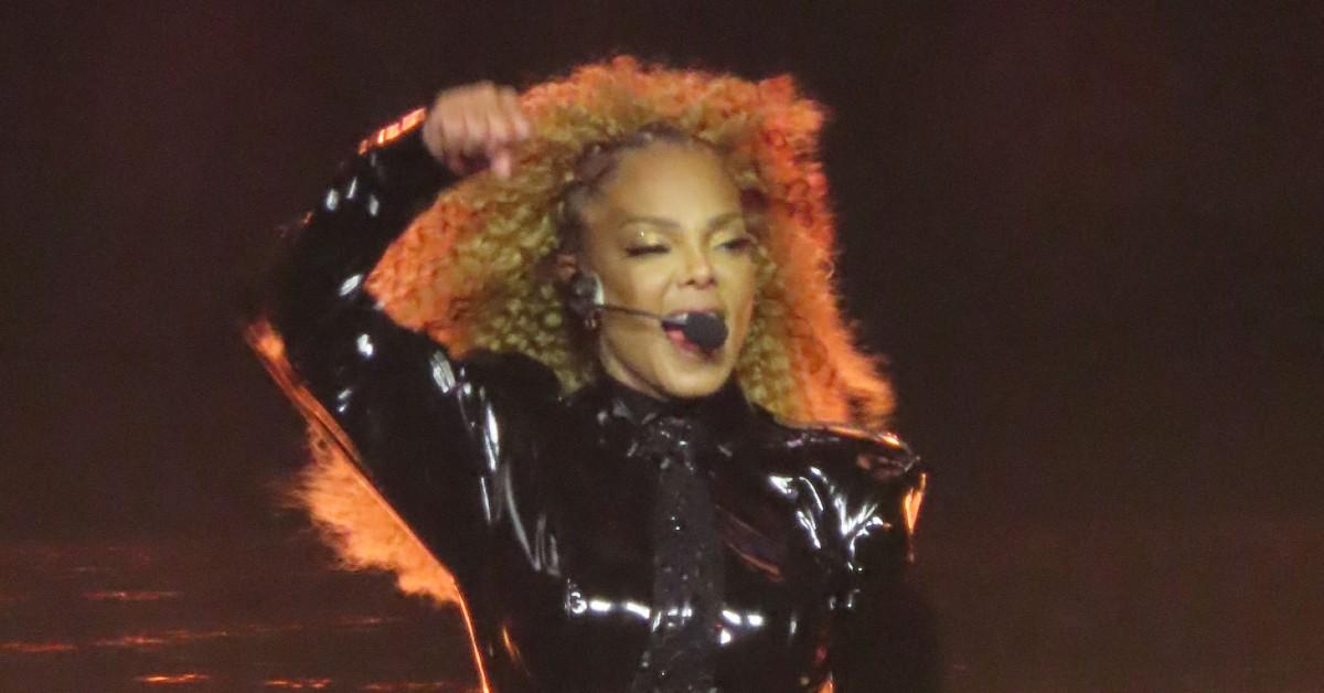 Janet Jackson Backup Dancer Rubs Hands On Singer's Chest