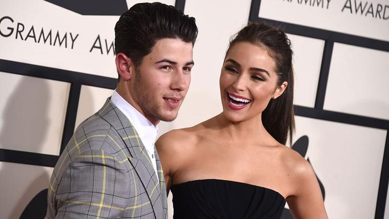 Nick Jonas And Girlfriend Olivia Culpo Cuddle On 2015 Grammy Awards Red ...