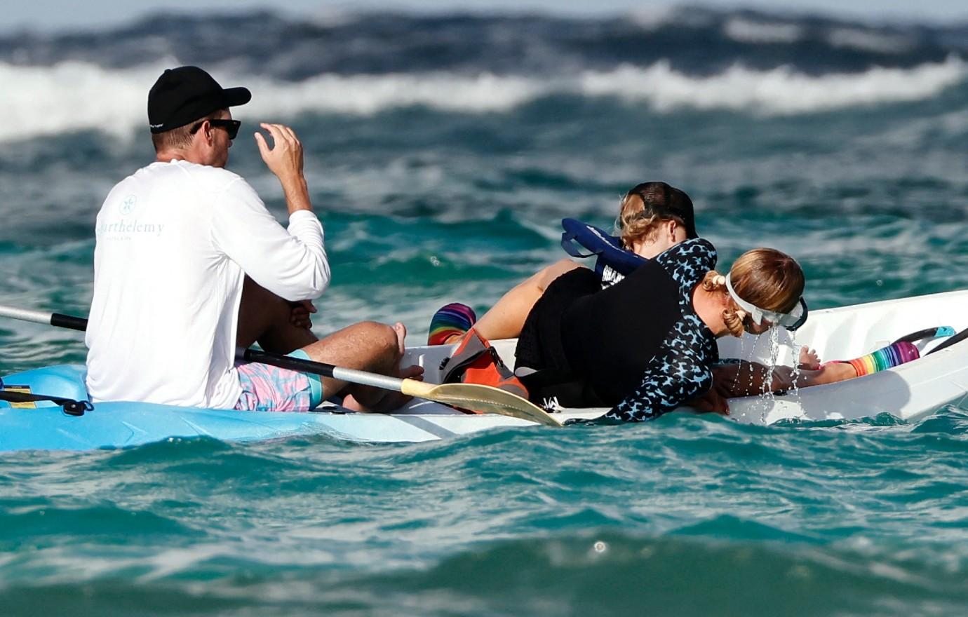 Paris Hilton Takes A Tumble During Kayak Ride With Son Phoenix: Photos