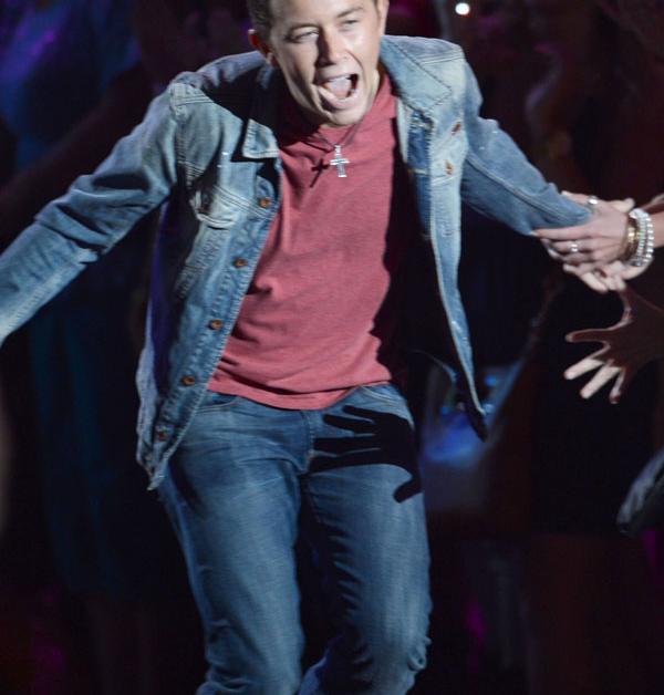 WATCH: Scotty McCreery Falls Off Stage During New York Show, Blames ...