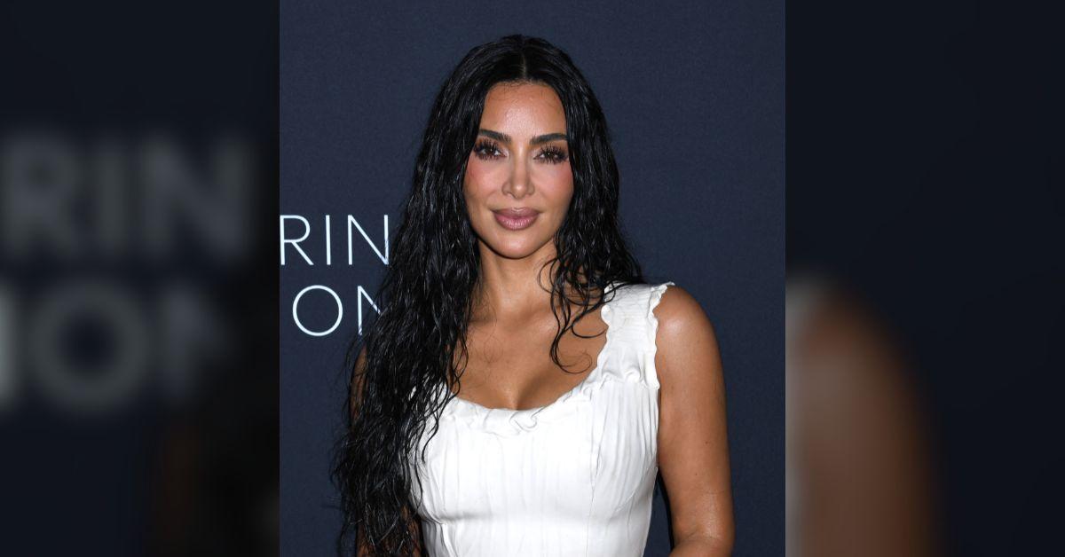 Kim Kardashian Spills Out Of Silver Bathing Suit Top In Hot New Photos