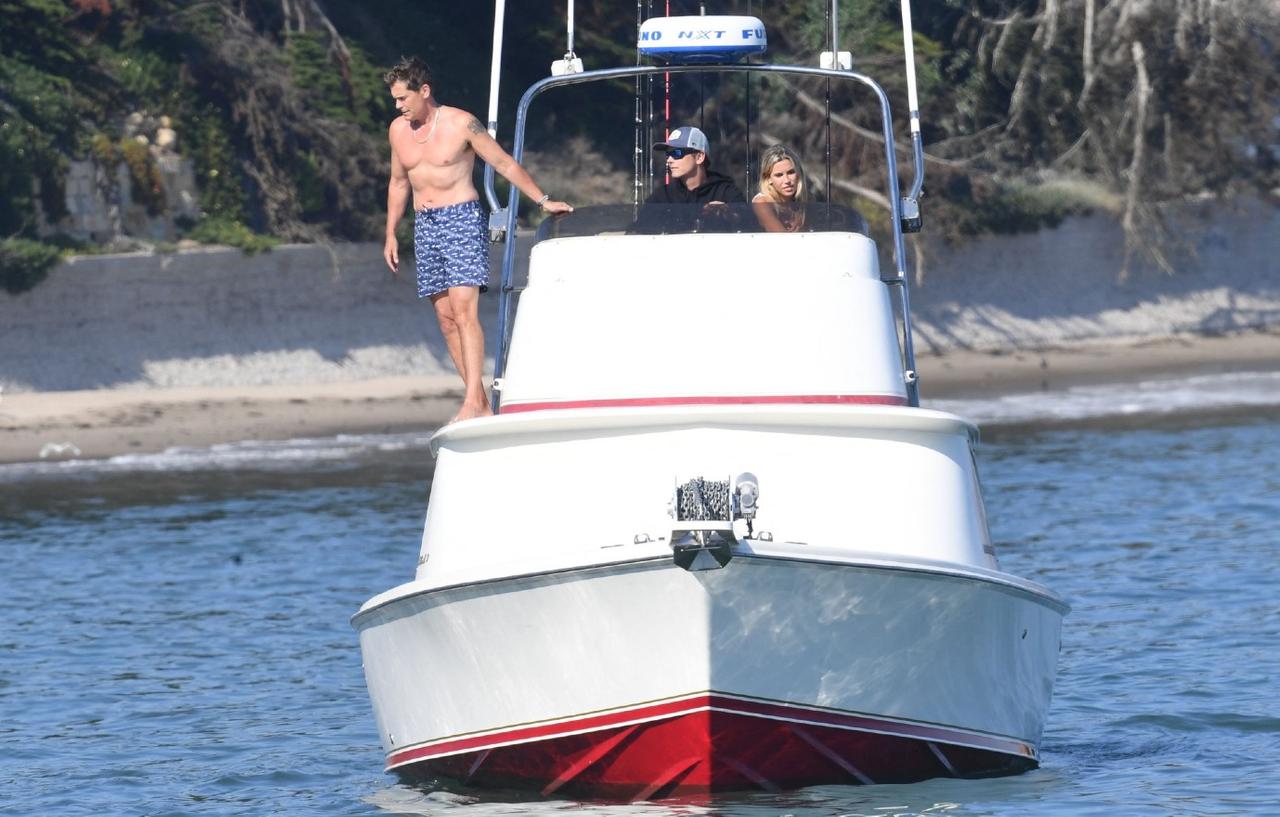 Rob Lowe, 60, Goes Shirtless On A Boat For July 4th: Photos