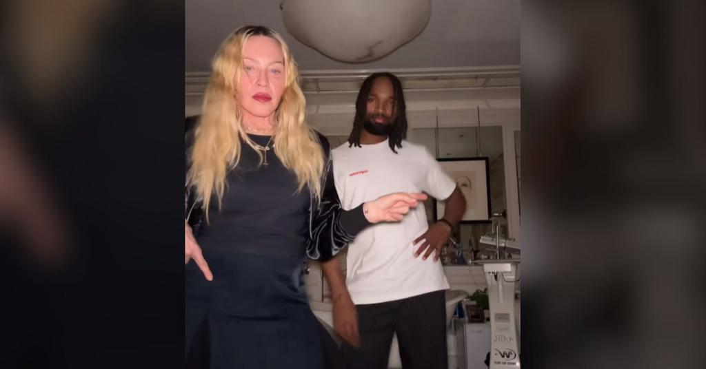 Madonna Puzzles Fans As She Shows Off Diamond Grill On Toilet