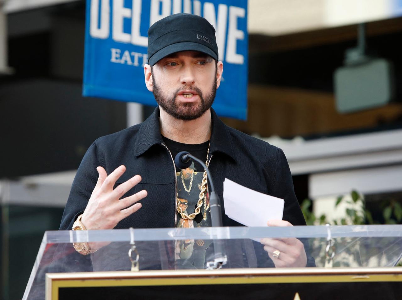 Eminem & Daughter Hailie Jade Attend Detroit Lions Game: Photos