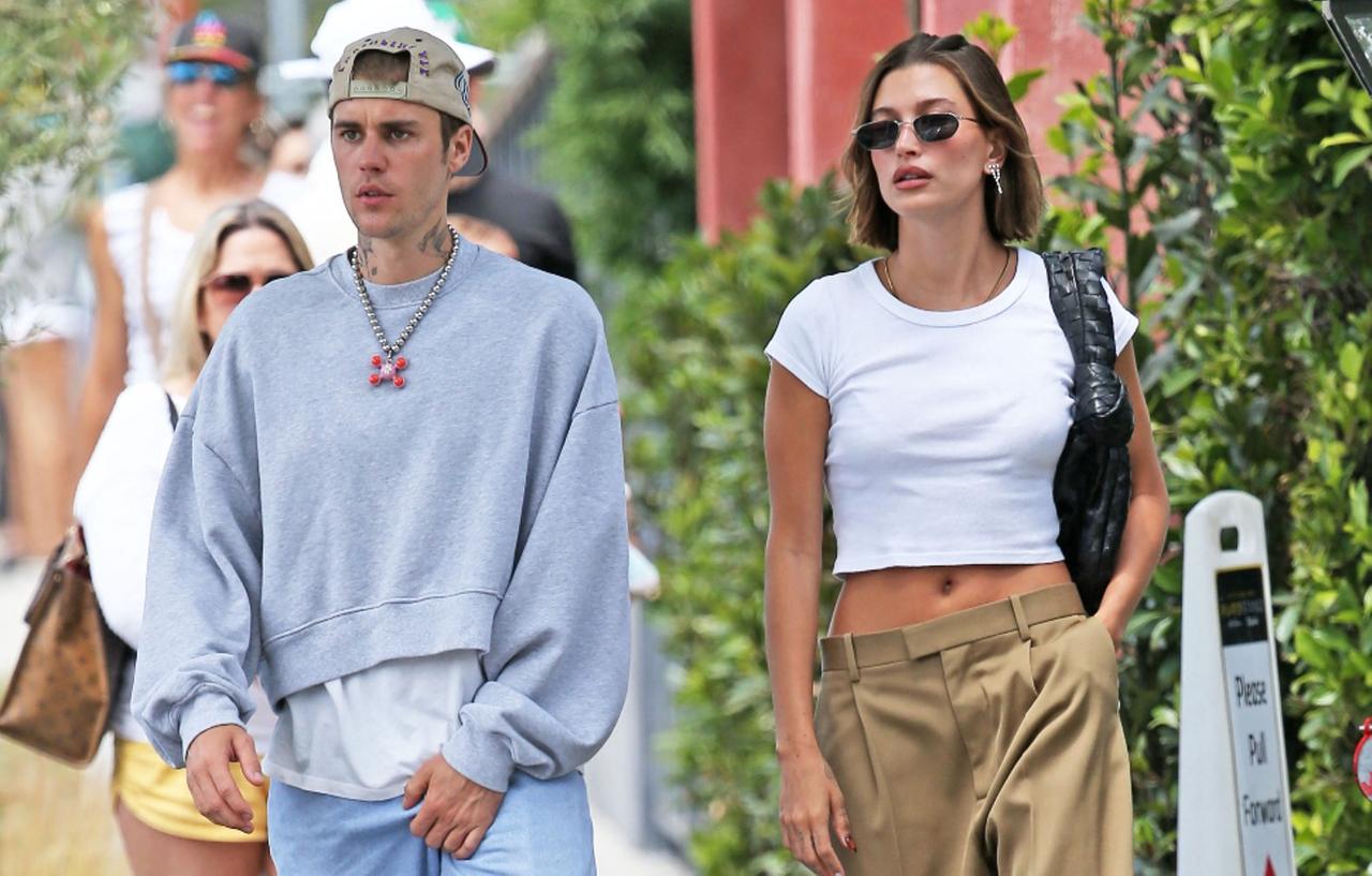 Justin & Hailey Bieber Pack On The PDA At Coachella: Watch