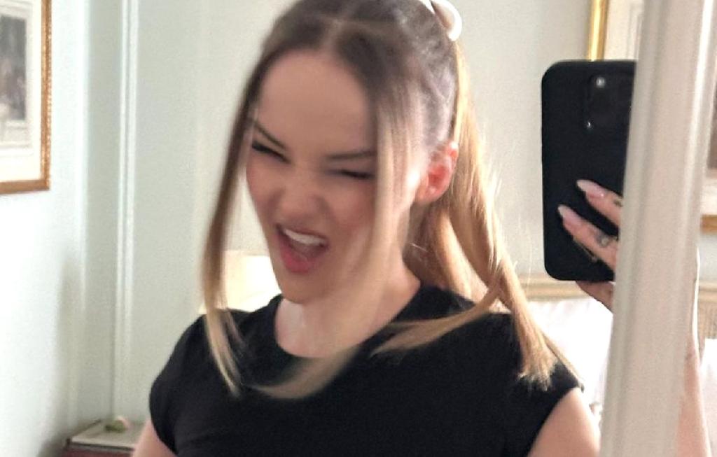 Dove Cameron Covers Her Chest With Only Her Hair In New Selfie