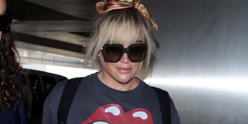 PICS Kesha Looks Rock Star Chic As She Leaves LAX With Beau