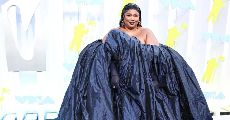 Lizzo Wears Low-Cut Dress In New Music Video After Weight Loss: Watch