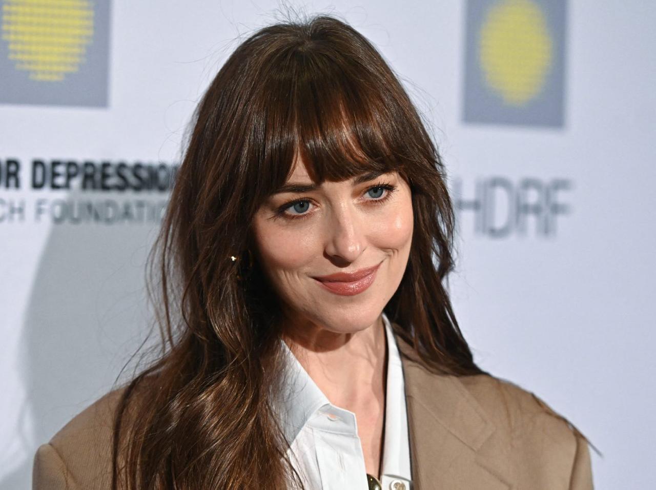 Dakota Johnson & Chris Martin Secretly Got Engaged Years Ago: Source
