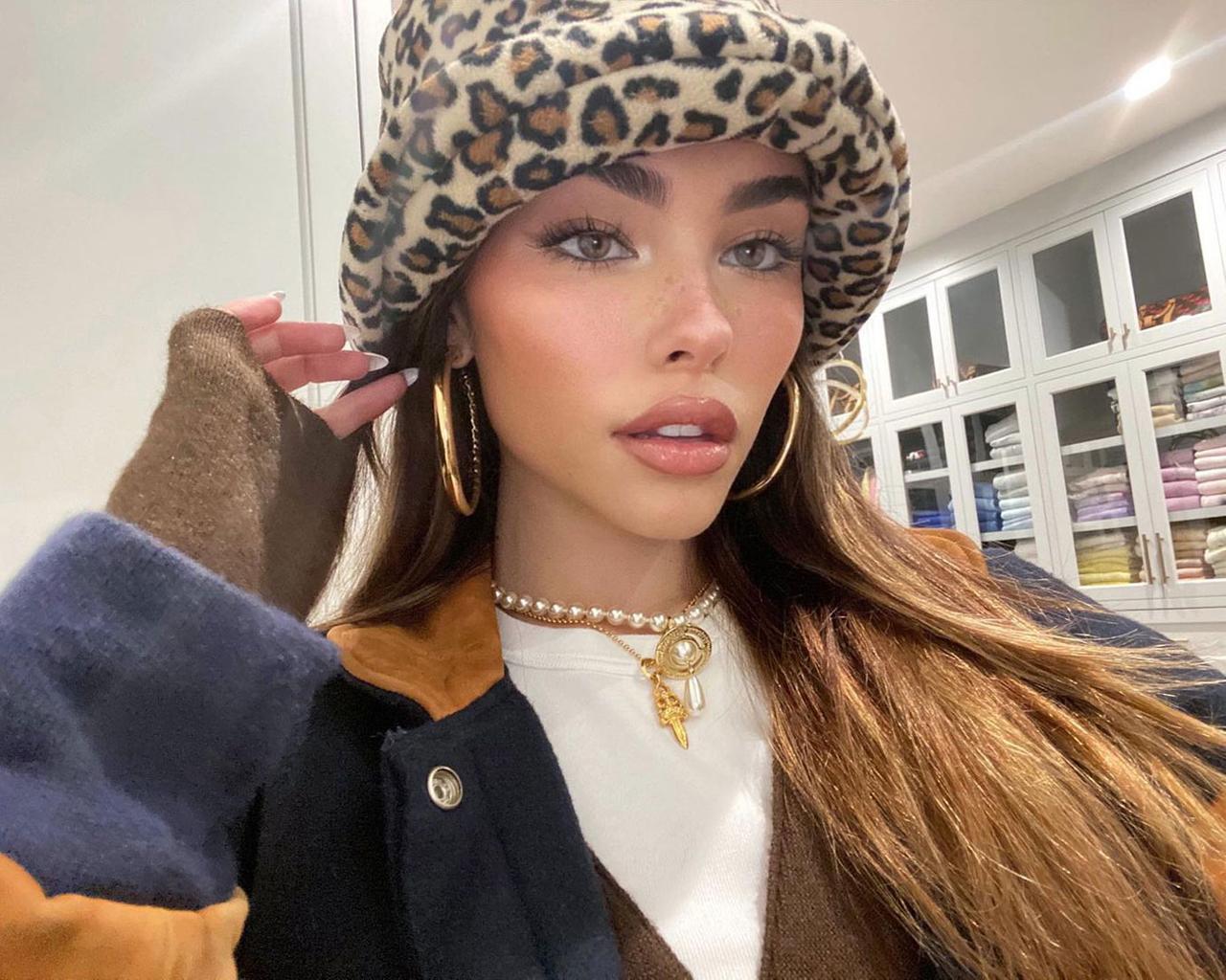 Madison Beer Wears Trendy Bucket Hat and Varsity Jacket