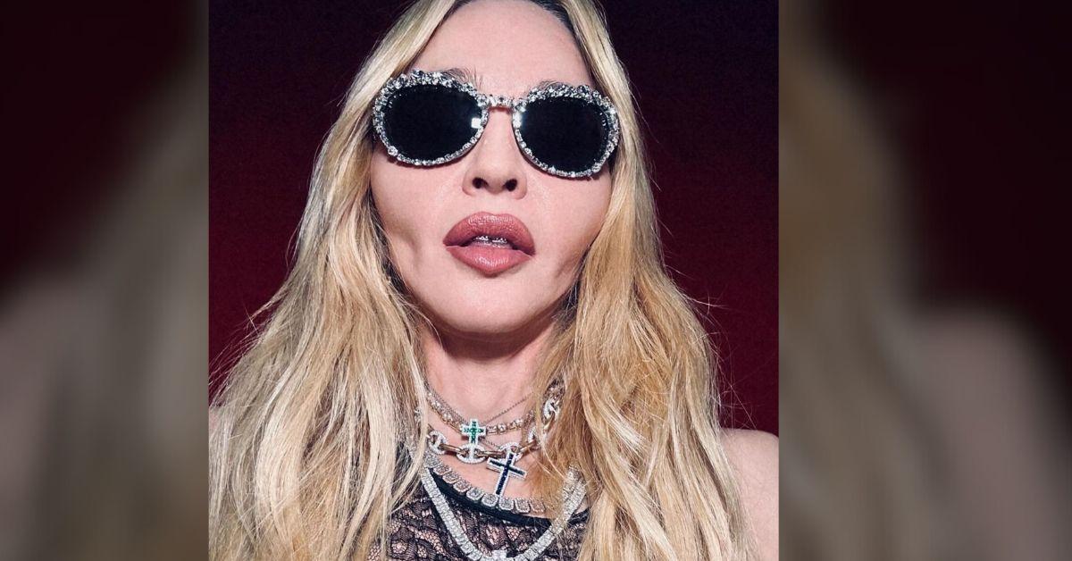 Madonna 65 Goes Topless As She Cuddles Up To Mystery Man Photos