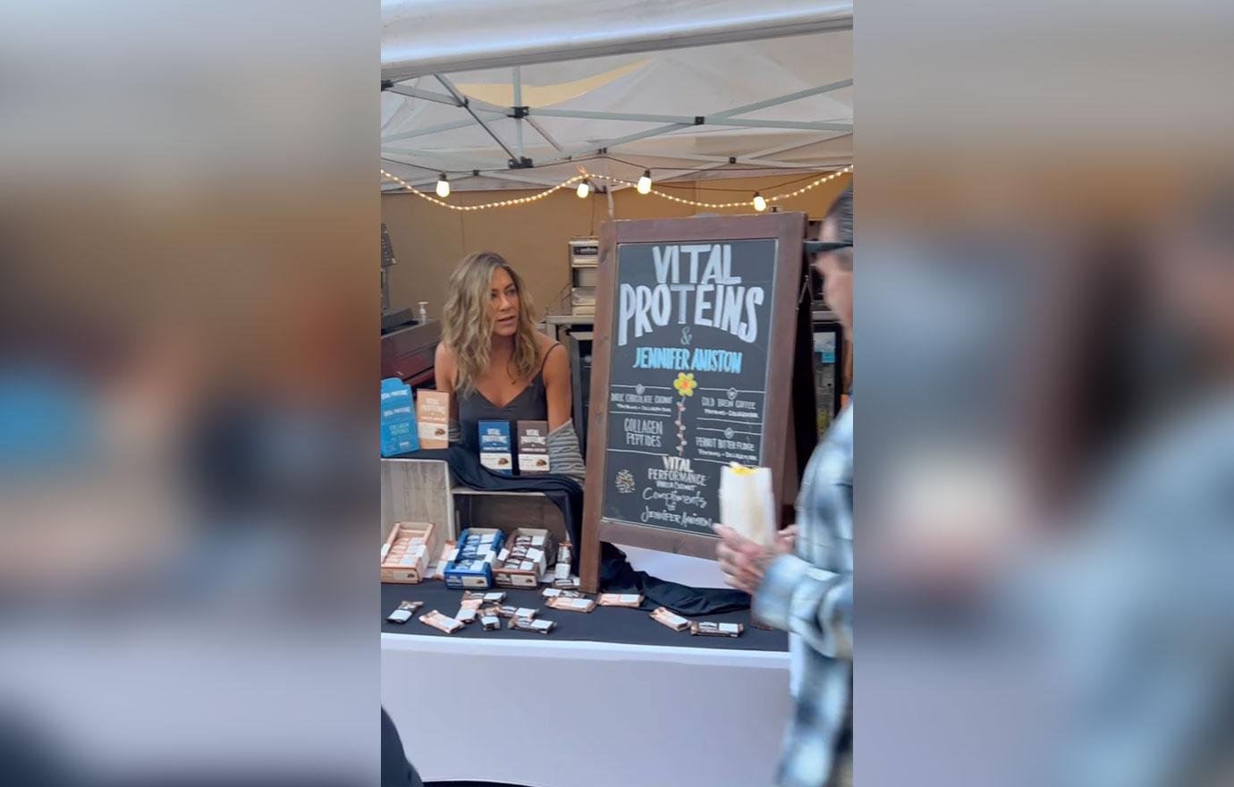 Jennifer Aniston & Jon Hamm Sizzle In Hilarious New Protein Bar Ad