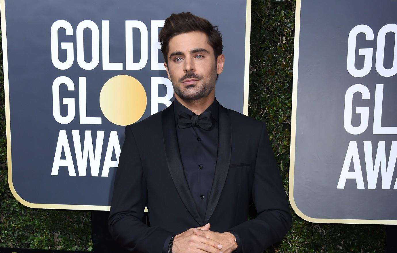 Zac Efron Shows Off Muscles, Turns Heads Filming New Movie