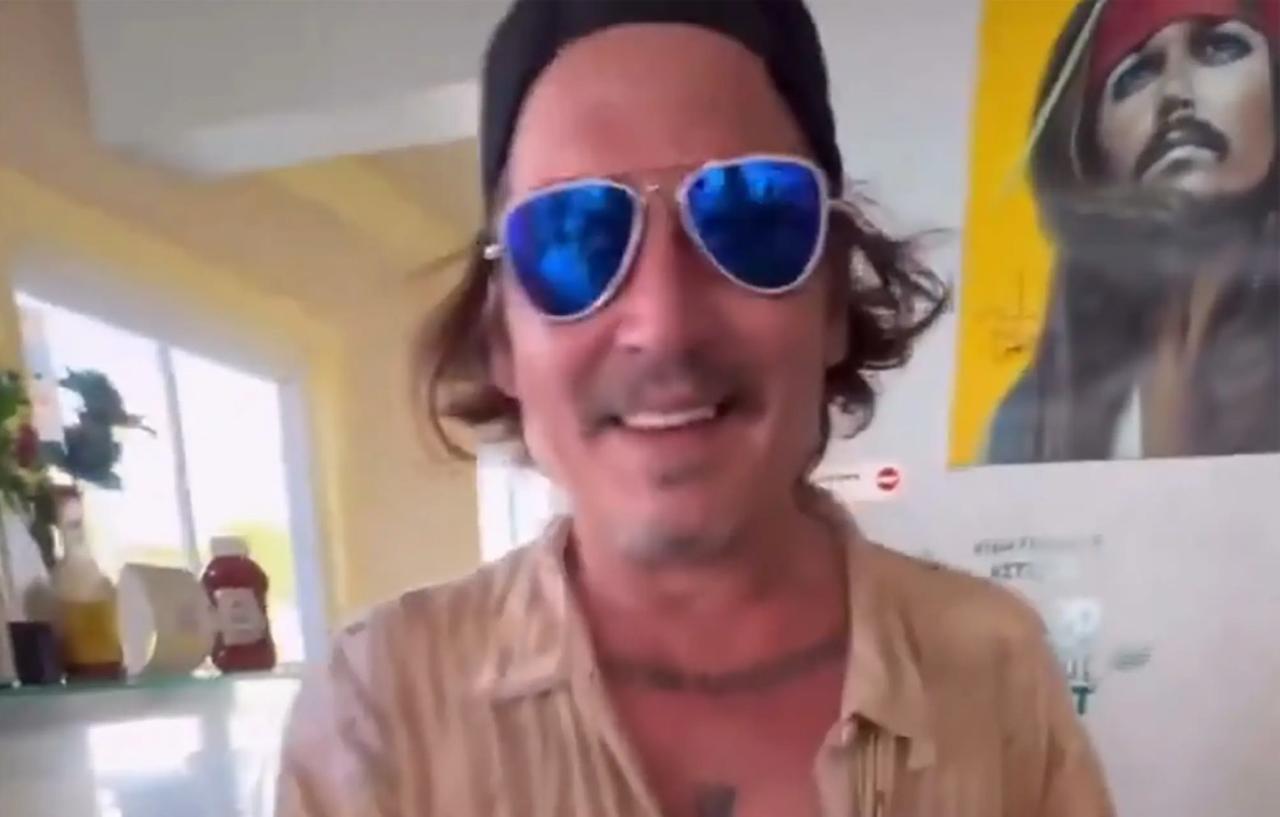 Johnny Depp Shows Off New Teeth In New Video