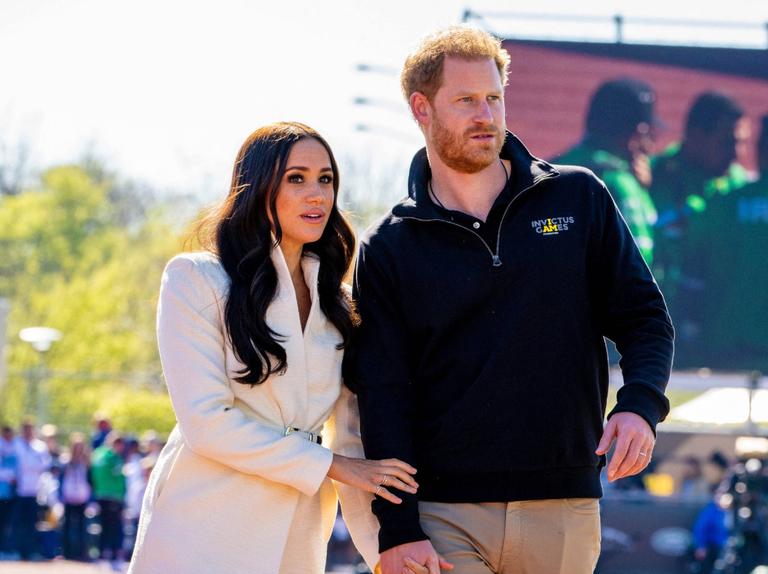 Prince Harry Carries Daughter Lilibet During Rare California Outing