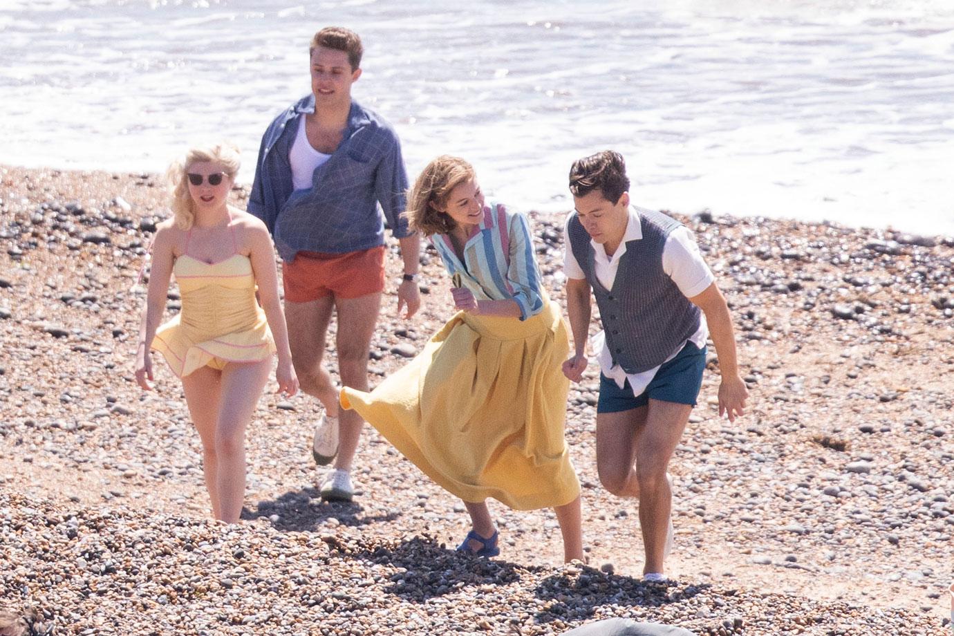 Harry Styles, Emma Corrin Frolic On Beach For 'My Policeman': Photos