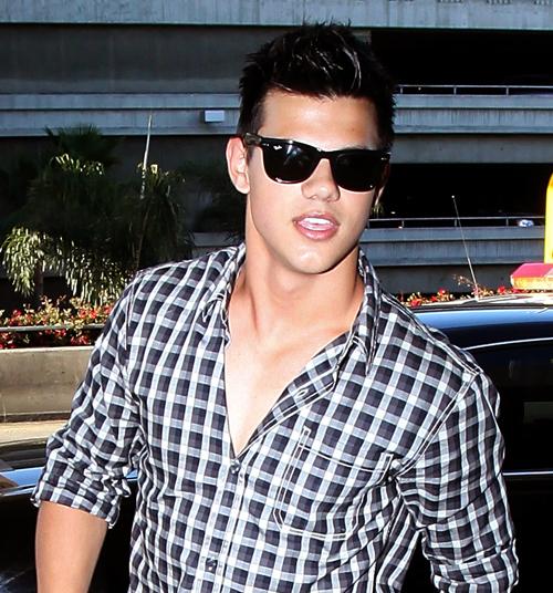 PHOTOS: Taylor Lautner Makes His Way to Vancouver