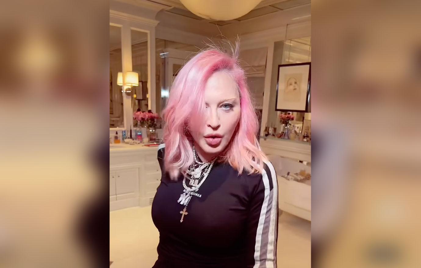 Madonna Arrived At Airport With Hot Pink Hairstyle