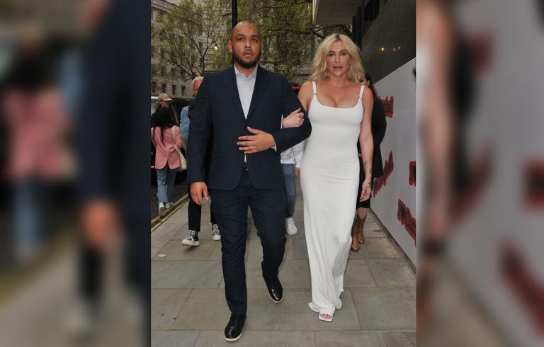 Pop Star Kesha Wears Plunging White Gown In London: Photos