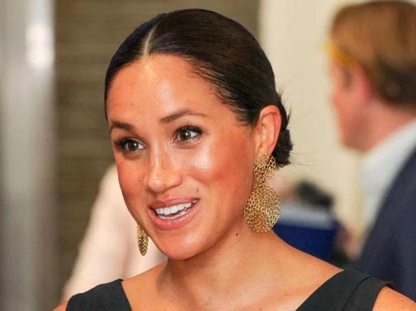 Meghan Markle Smiles In Rare Photo With Friends As Prince Harry Works