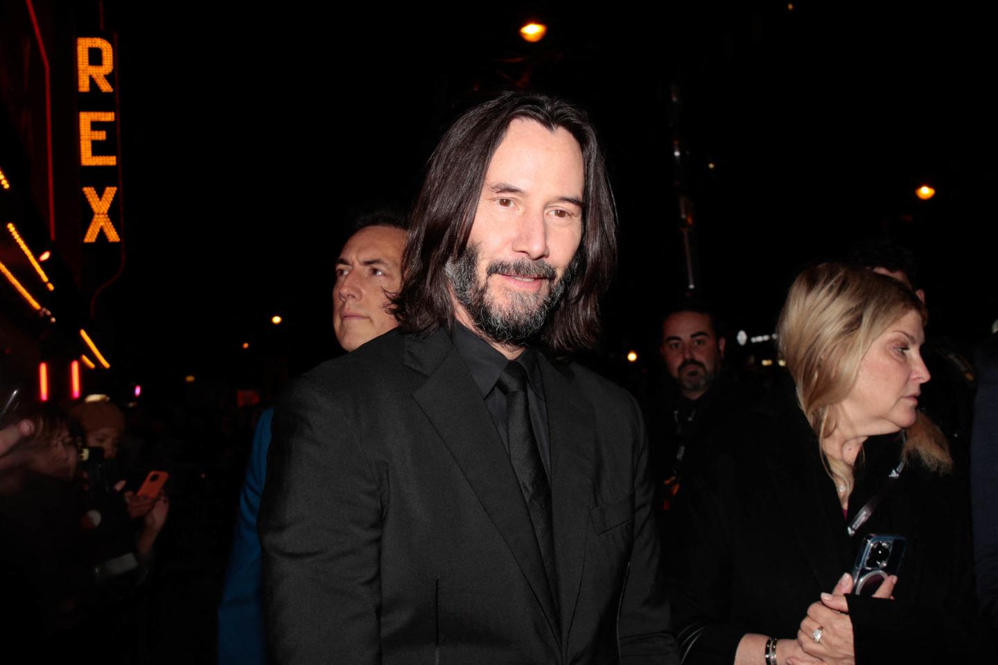 Unkept Keanu Reeves Checks Out Hollywood Guitar Shop