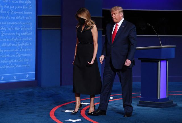 Melania Trump Wears Big Hat To 'Hide' From Donald At Graduation
