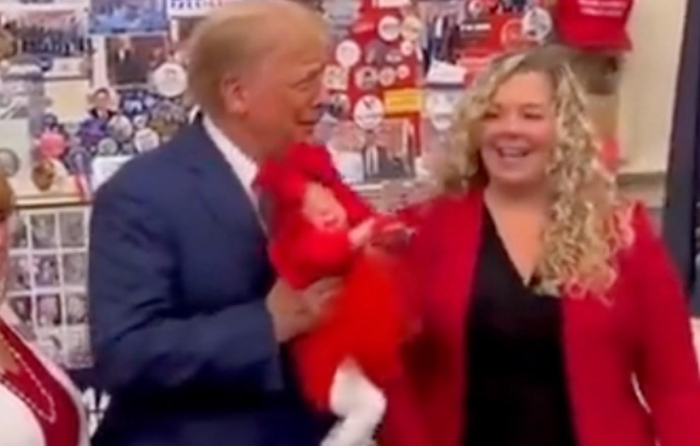 Donald Trump Mocked After Awkwardly Holding Infant For Photo-Op