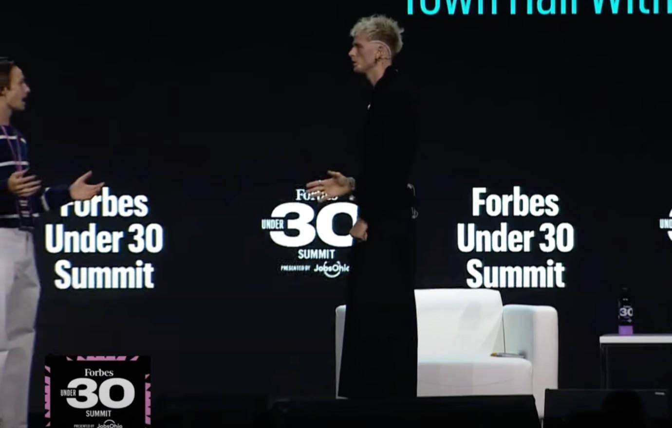 Machine Gun Kelly Apologizes After Fan Storms Stage At Forbes Summit
