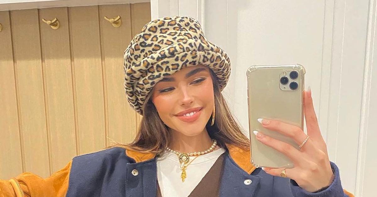 Madison Beer Wears Trendy Bucket Hat and Varsity Jacket