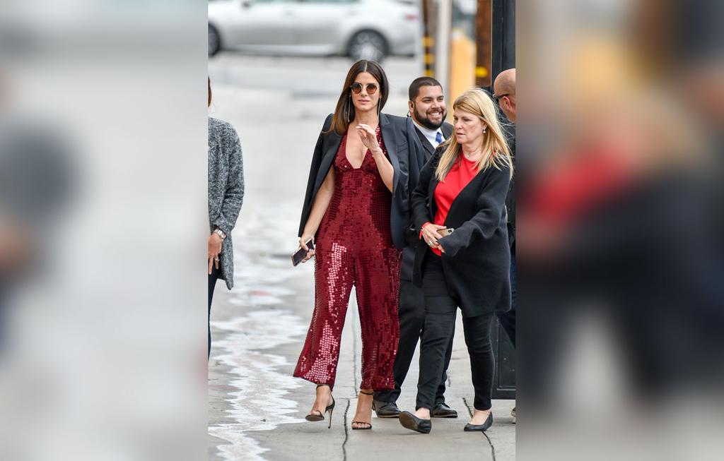 Sandra Bullock Wows In A Low-Cut Red Sequined Jumpsuit