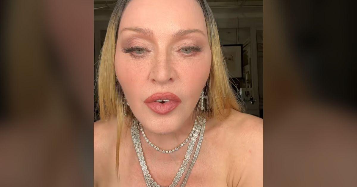Madonna Puzzles Fans As She Shows Off Diamond Grill On Toilet