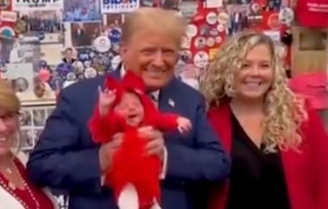 Donald Trump Mocked After Awkwardly Holding Infant For Photo-Op