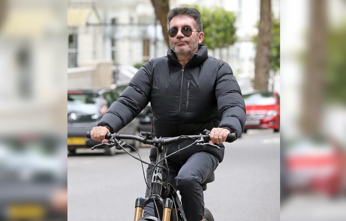 Simon Cowell Back On Electric Bike Sans A Helmet
