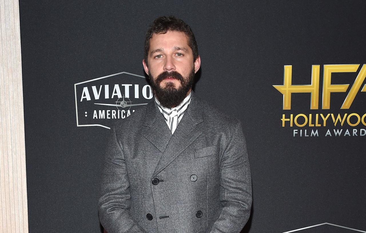 Shia LaBeouf Carries Baby Alongside Mia Goth In Disneyland