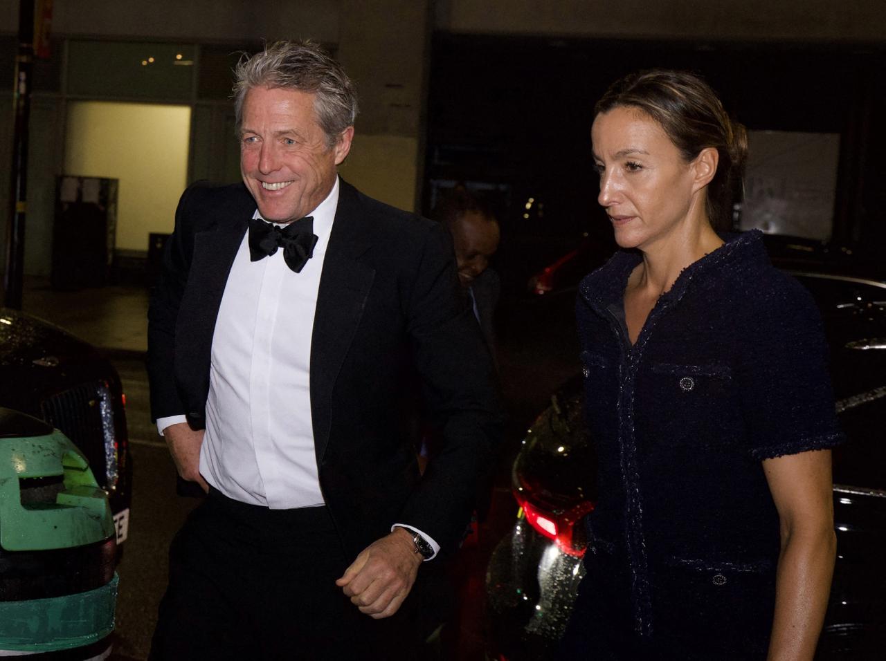 Hugh Grant Got 'Smashed On Tequila' With Travis Kelce At Eras Tour