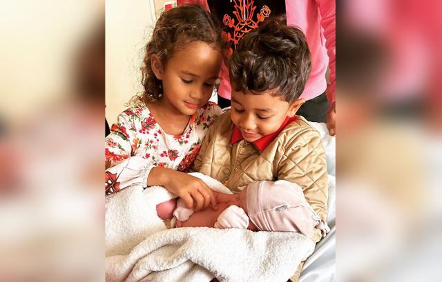 John Legend Is All Smiles While Holding New Baby Girl Esti: Photo